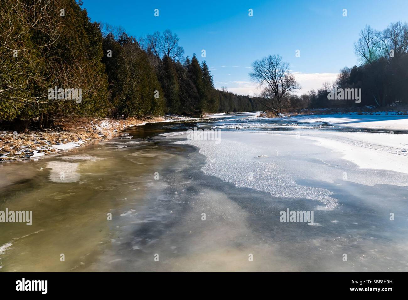 Winter landscape. The ice covered Grand River near Elora. the Elora ...