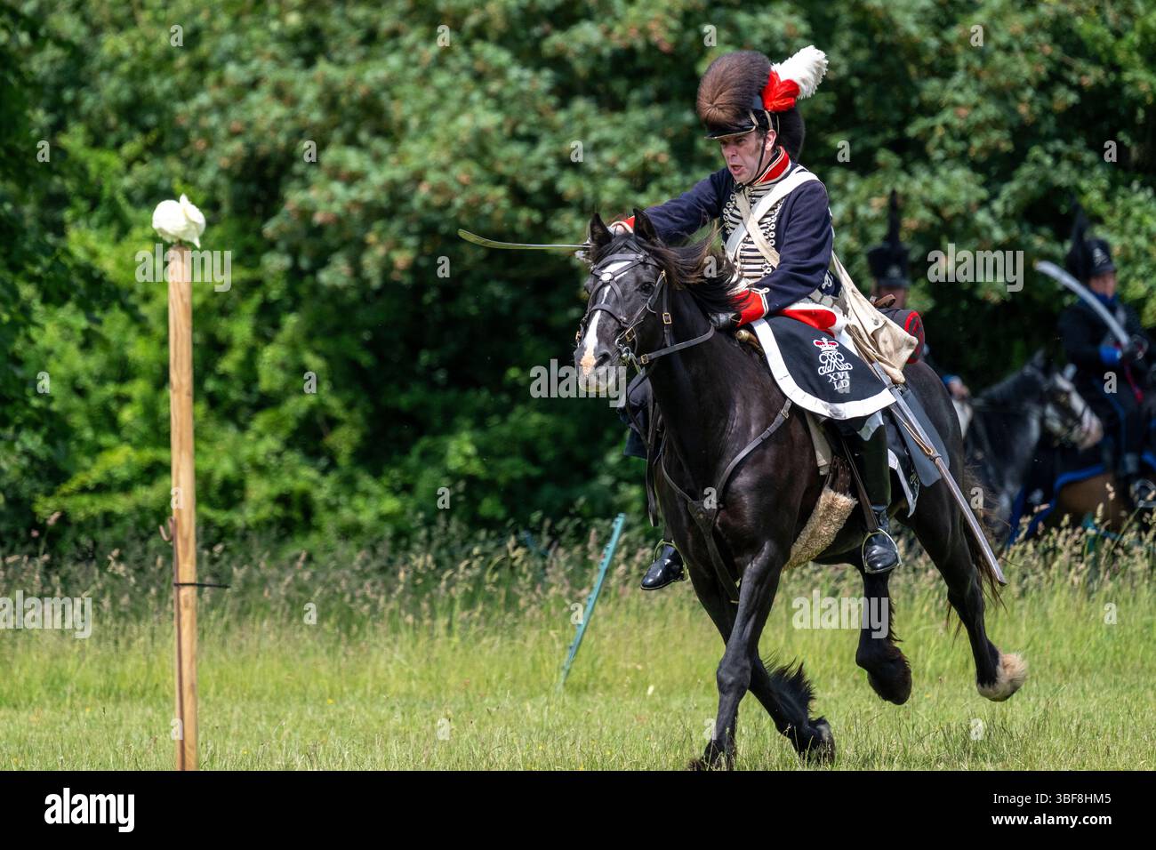 Chalfont, UK. 31 May 2025. Re-enactors perform cavalry skill drills ...
