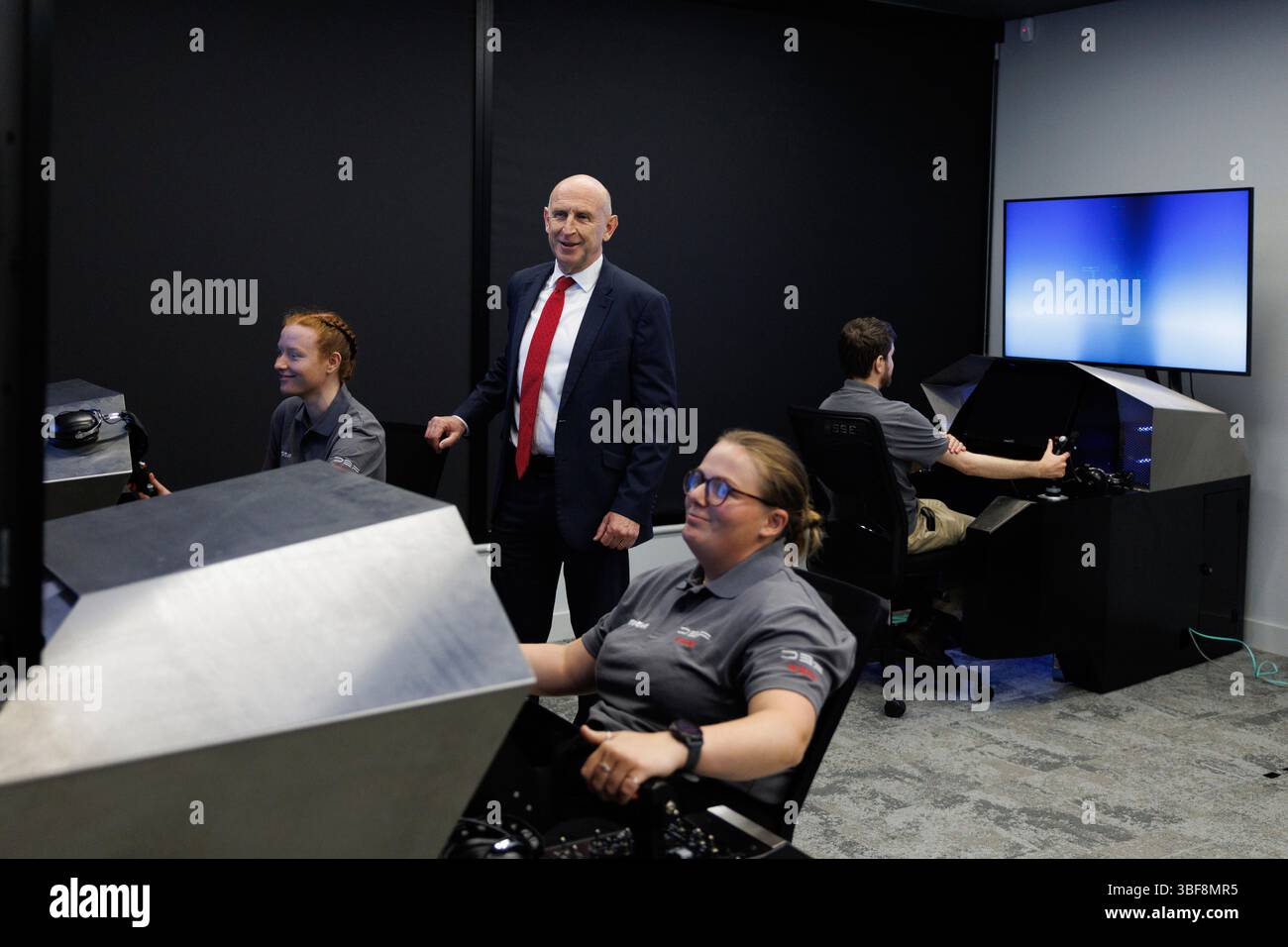 Britain's Defence Secretary John Healey is shown an air to air combat ...