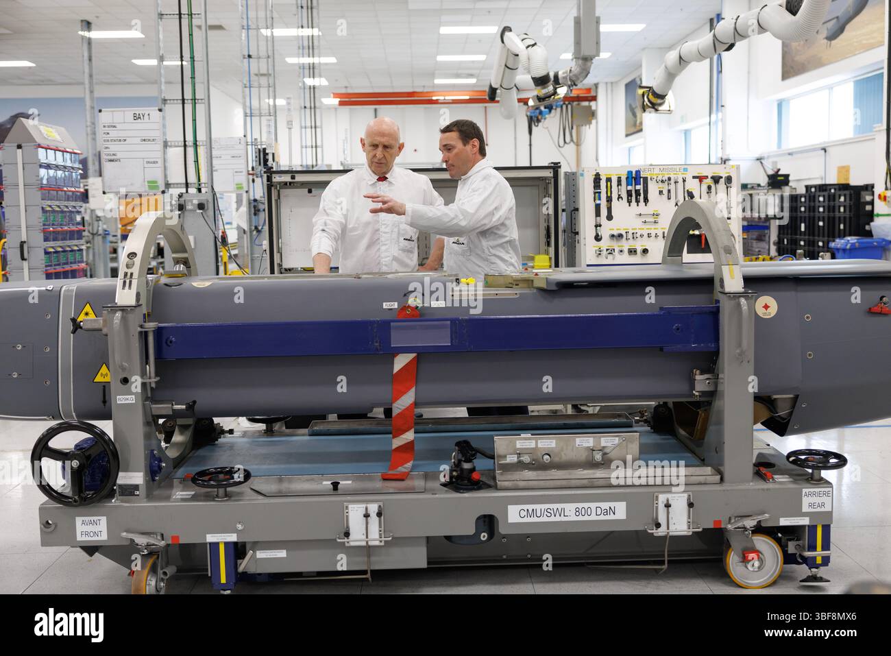 Director of Mechanical Engineering Matt Beamont (right) shows Defence ...
