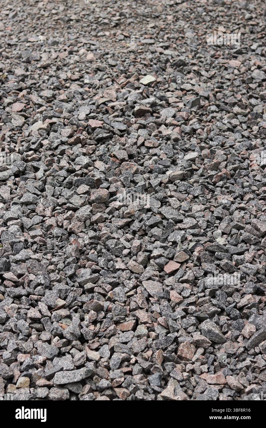 Granite crushed stone. A large pile of crushed stone for repair work ...