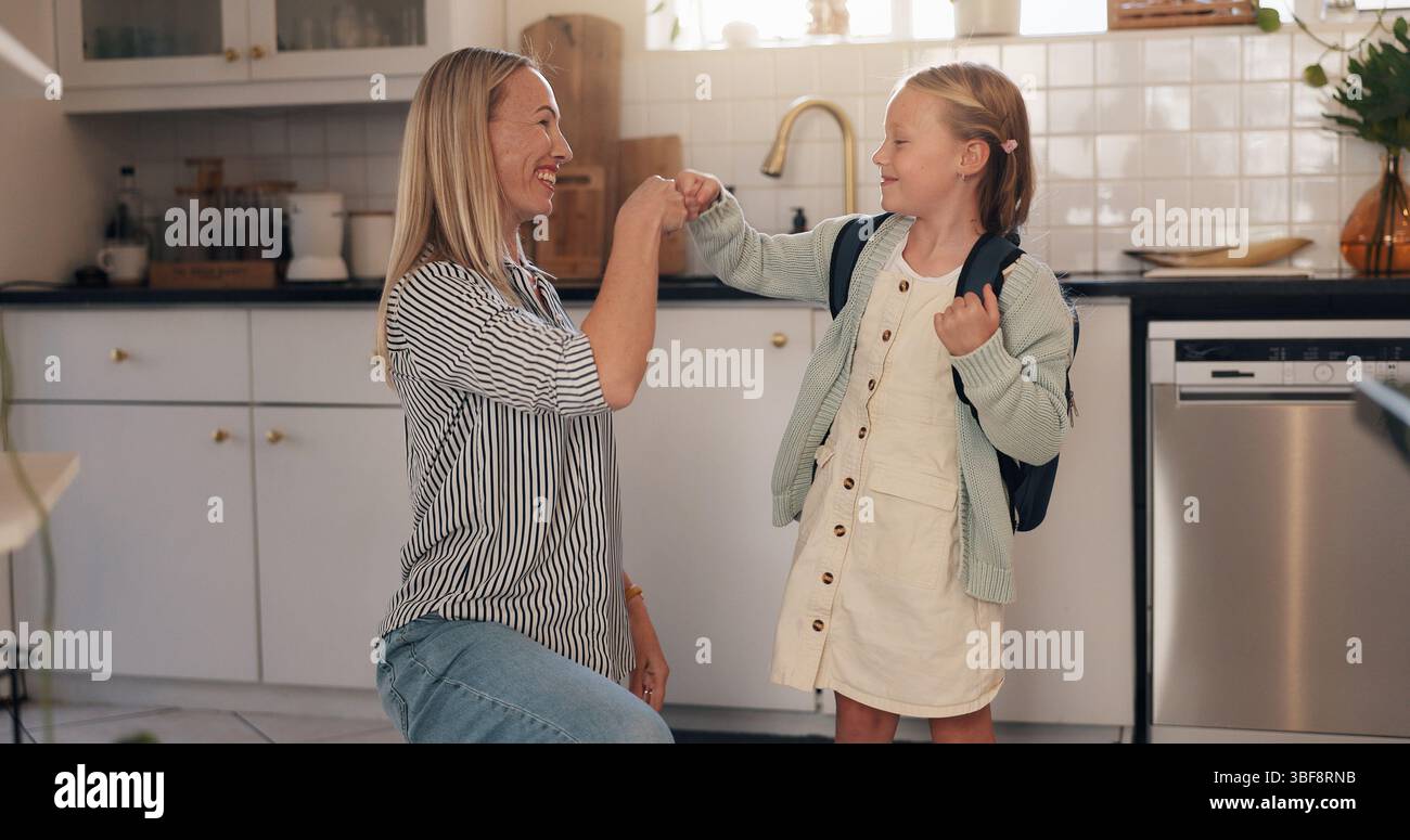 Fist bump, mother and child with backpack in home for back to school ...