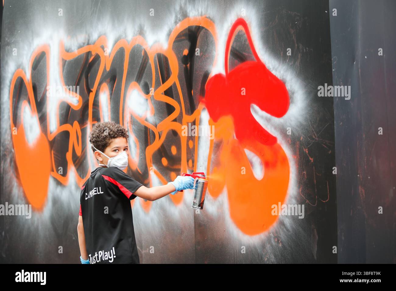 Birmingham, UK. 31st May, 2025. A young boy shows off his graffiti ...