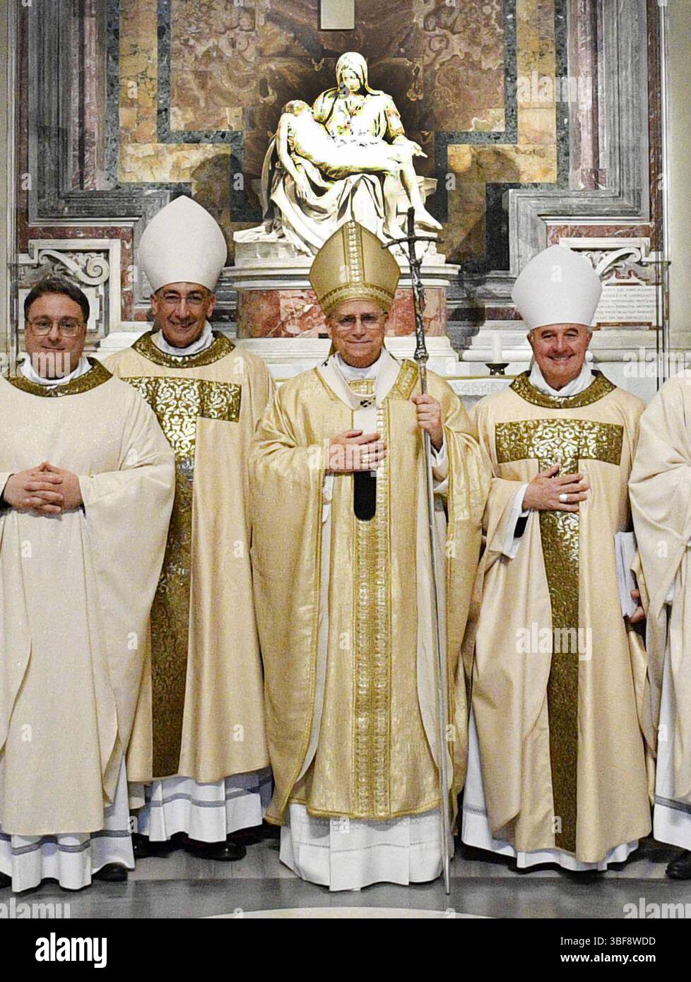 Pope Leo XIV poses with the new priests in front of Michelangelo's ...