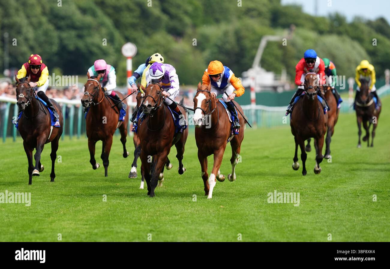 Ten Bob Tony ridden by William Buick (centre right) coming home to win ...