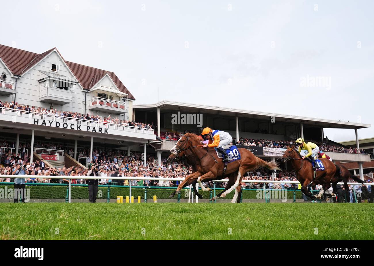 Ten Bob Tony ridden by William Buick (left) coming home to win the ...