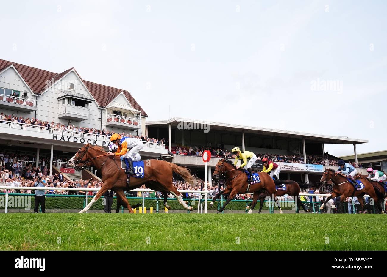 Ten Bob Tony ridden by William Buick (left) coming home to win the ...