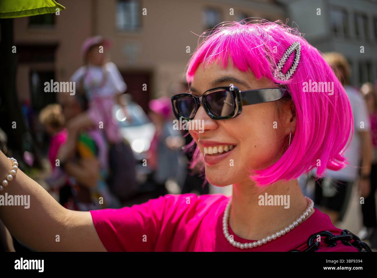 Visitors take part in the Pink Soup Fest festival in Vilnius, Lithuania ...