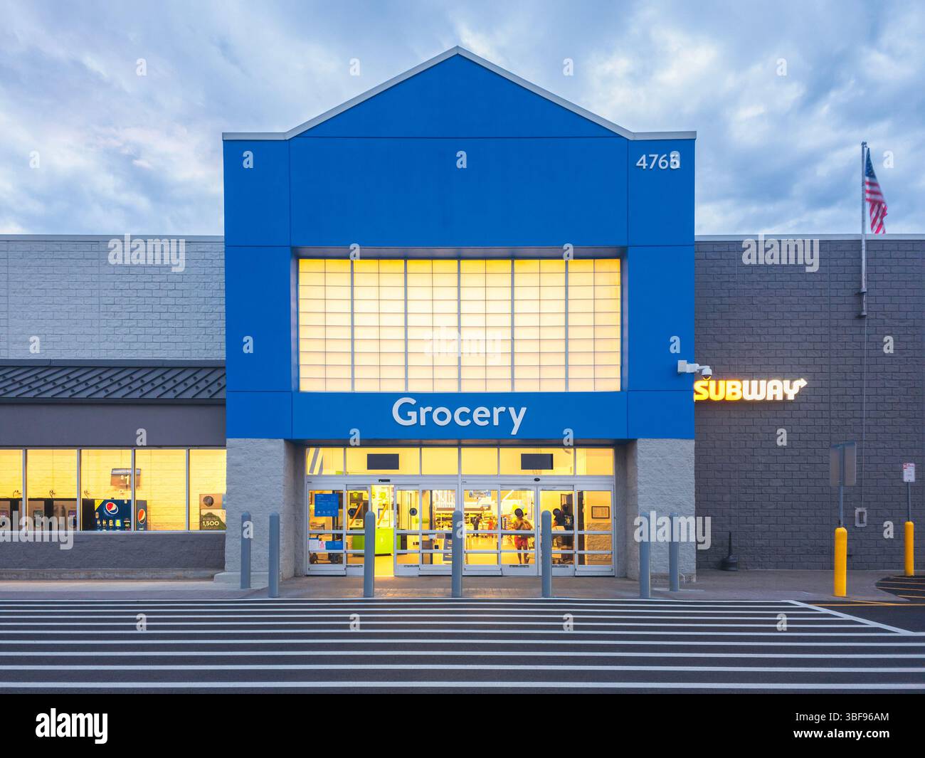 New Hartford, New York - Jun 25, 2024: Close-up night view of Walmart ...