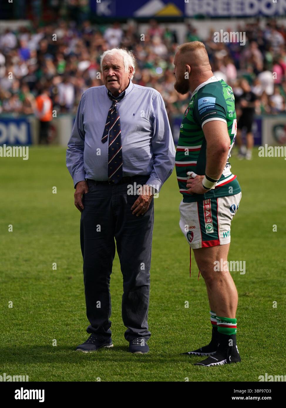 Leicester Tigers' Joe Heyes with club chairman Peter Tom after the ...