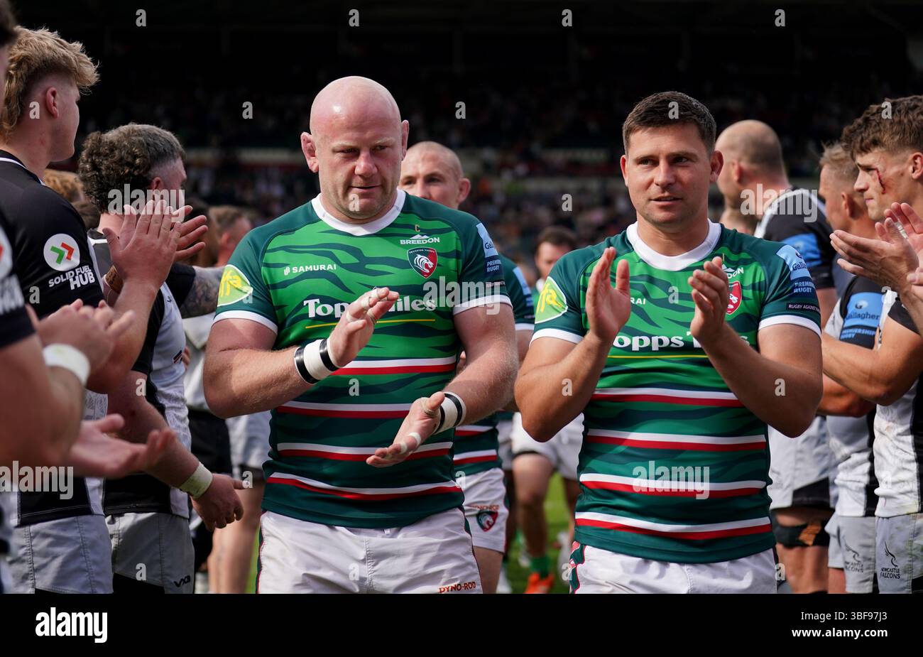 Leicester Tigers' Dan Cole (left) and Ben Youngs are given a guard of ...