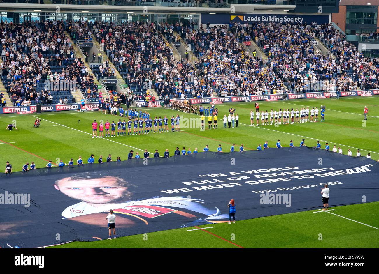 A banner of the late Rob Burrow on the pitch to raise awareness of ...