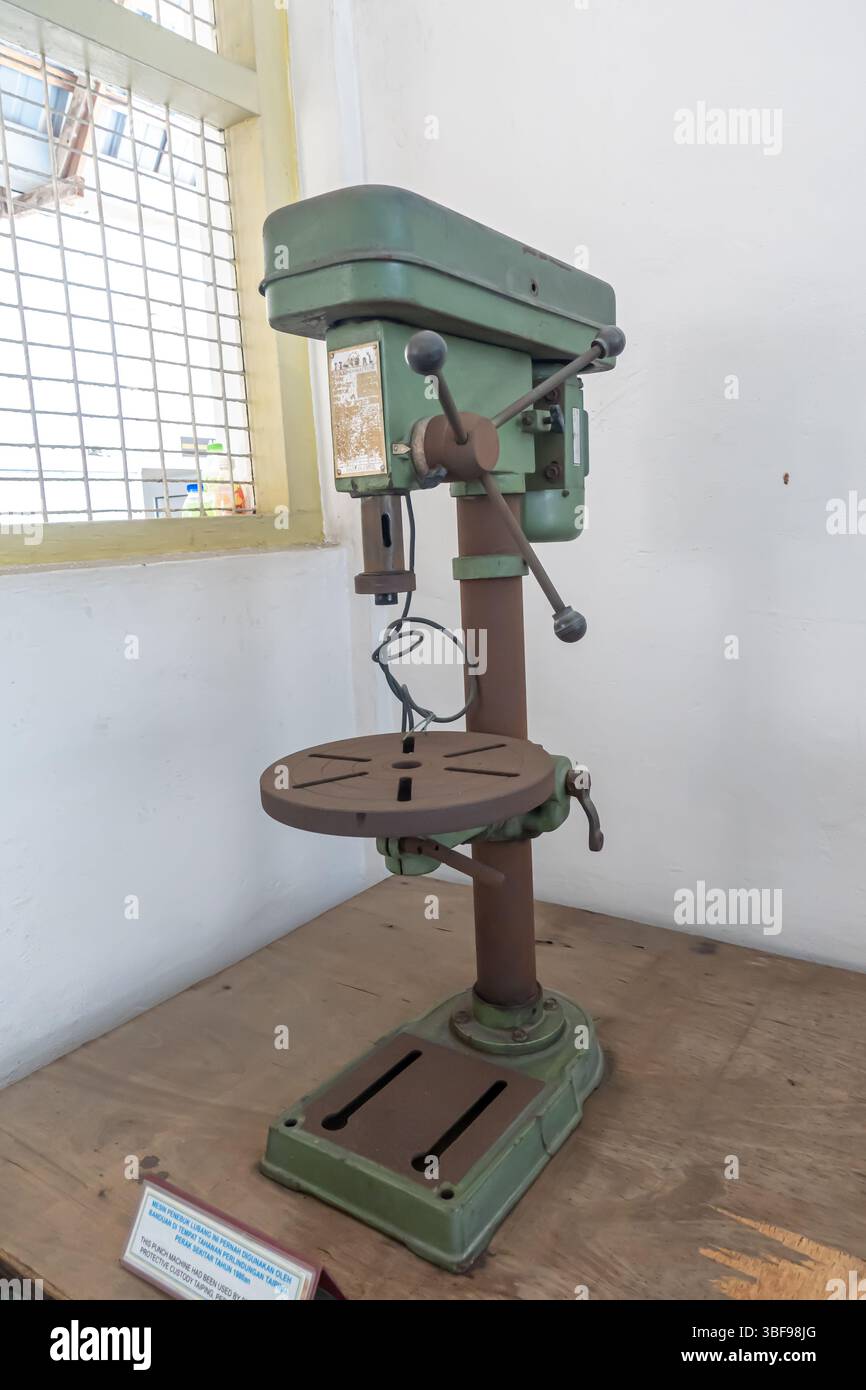 The 1980s punch machine used by prisoners in custody in Taiping, Perak ...