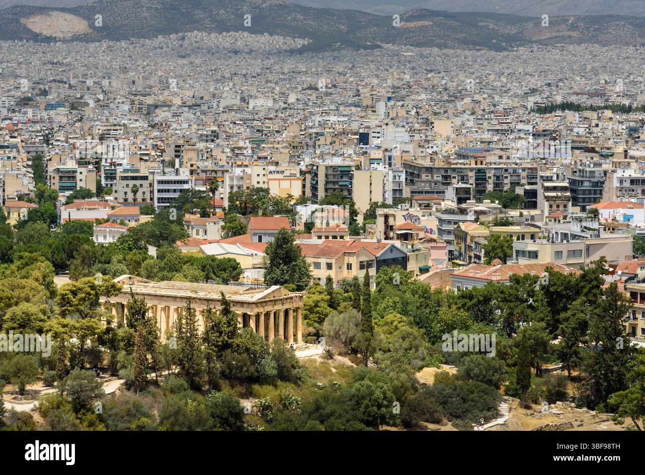 The Temple of Hephaestus, overlooking the ancient Agora of Athens, is ...