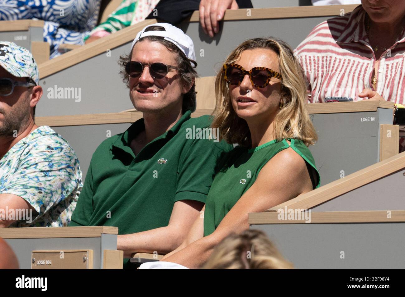 Caption Corrected - Amelie Etasse and Louis Genevey attend the Roland ...