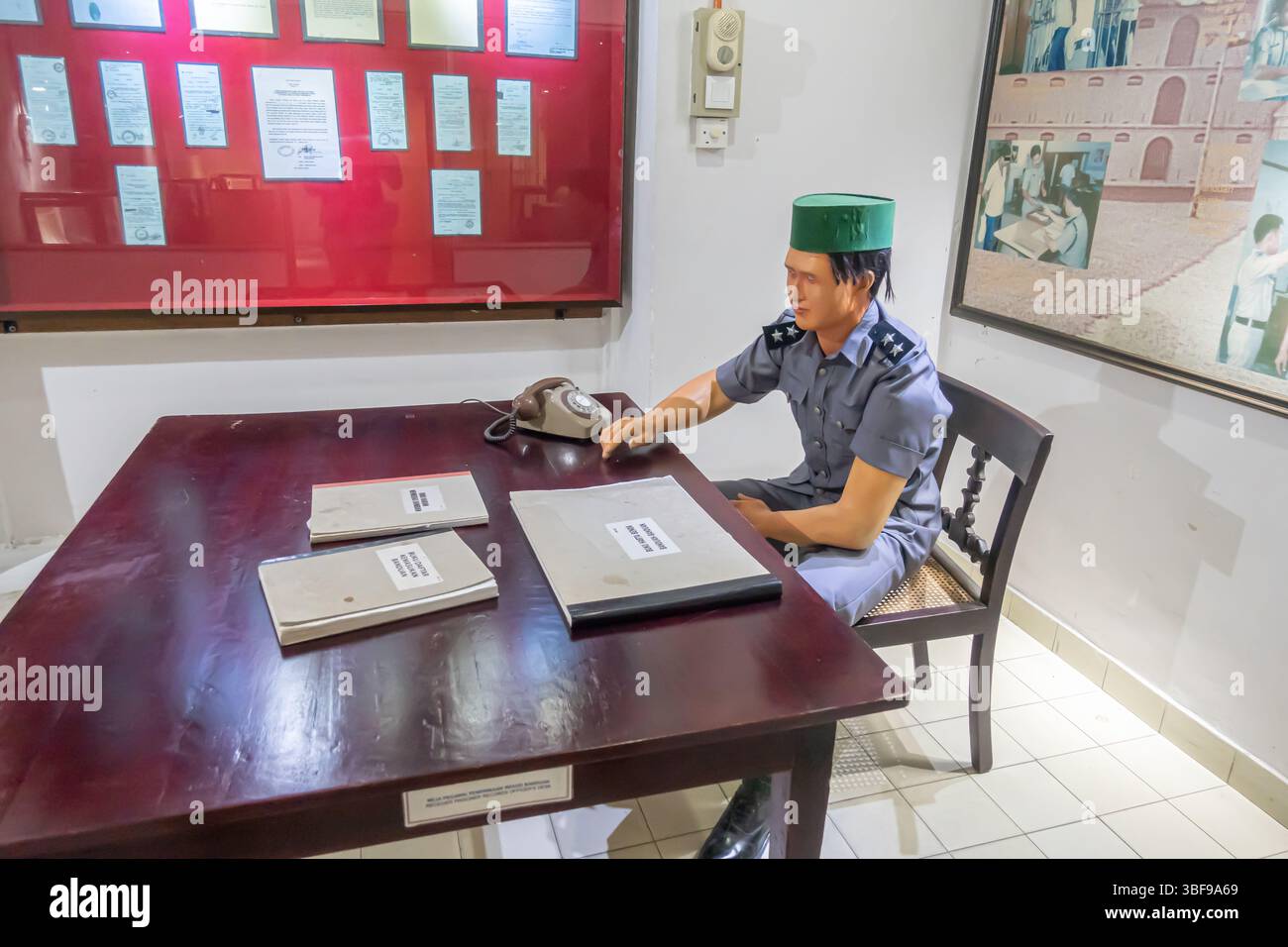Prison worker, receiver of prisoner desk model, office, Malaysia Prison ...
