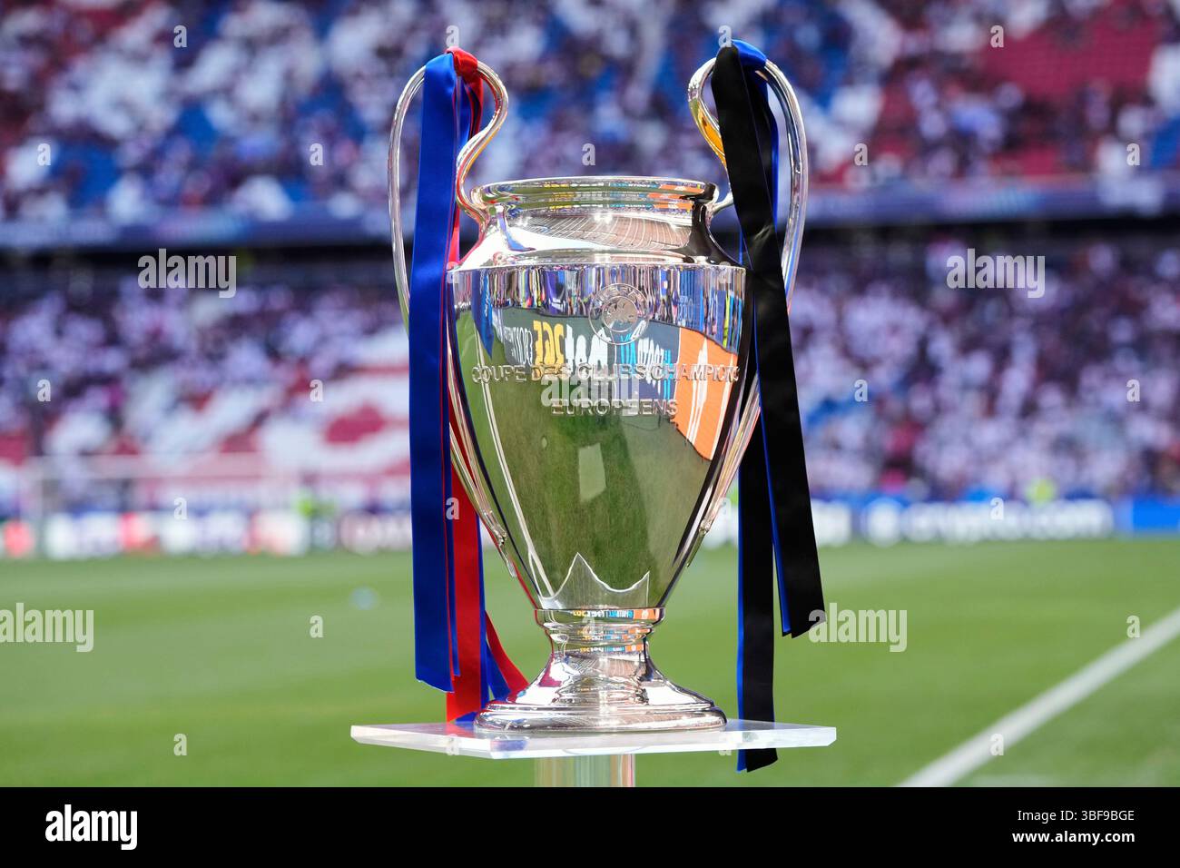 The trophy is displayed on the pitch before the Champions League final ...