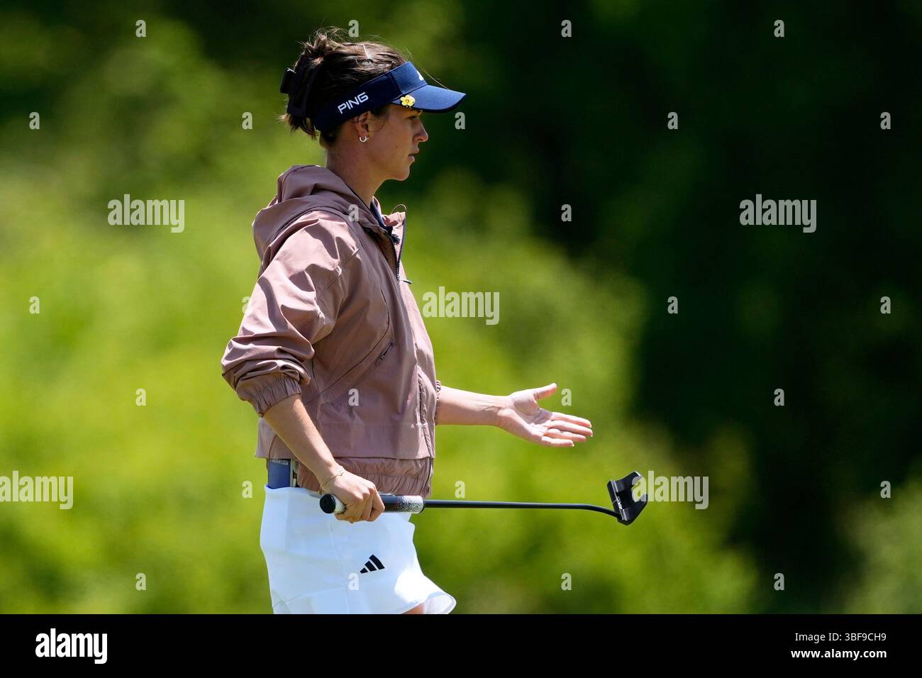 Linn Grant, of Sweden, reacts to a missed putt on the tird hole during ...