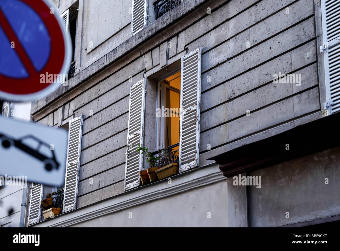 Close-up of a Parisian apartment window featuring classic white ...