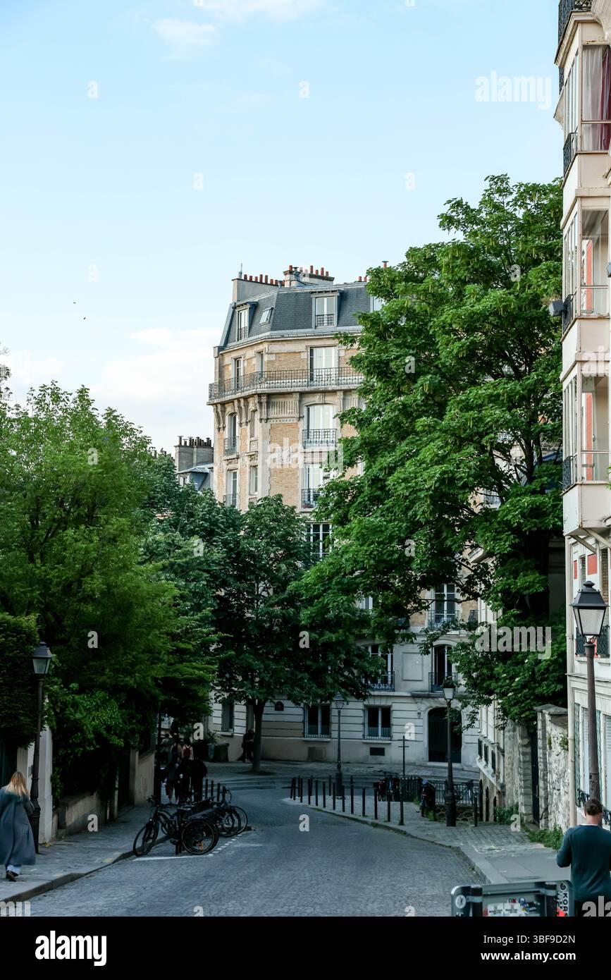 A view looking up a Parisian street towards the upper floors and ...