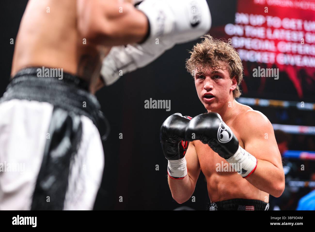 May 30, 2025: (R-L) Super Welterweight Cayden Griffiths looks for an ...