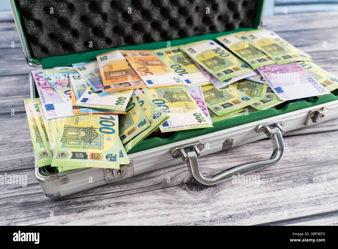 Bavaria, Germany - 31 May 2025: A metal suitcase full of euro bills ...