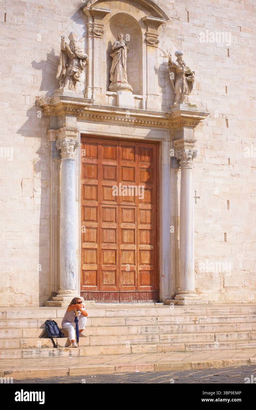 Tourist on the steps outside Bari Cathedral - Cathedral of Saint ...
