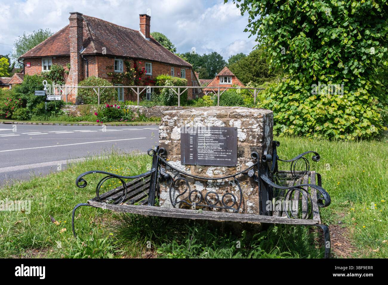 Story of Kirdford, plaque with history of the village on a bench in the ...
