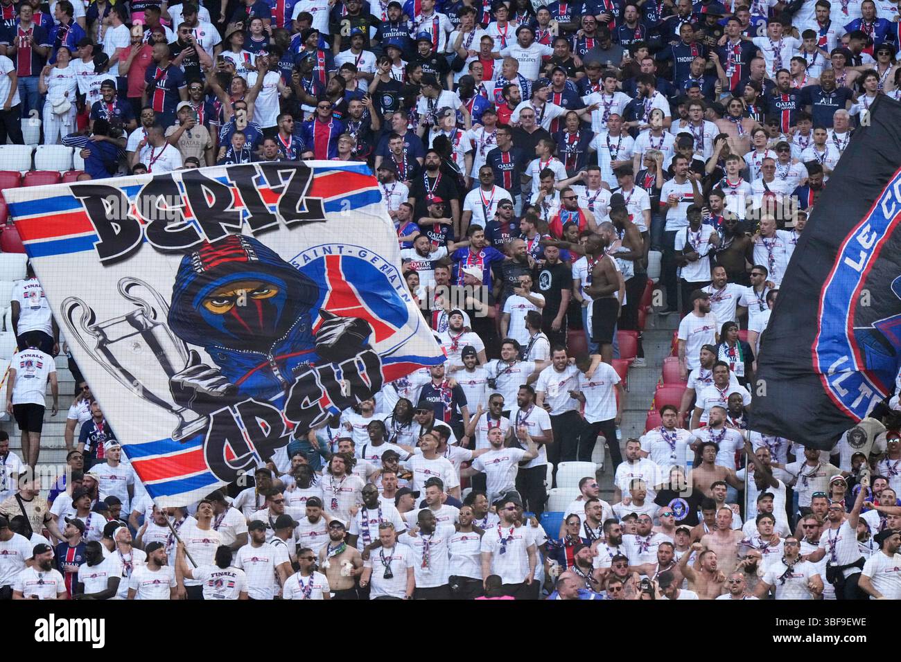 PSG fans wave flags on the stands ahead of the Champions League final ...