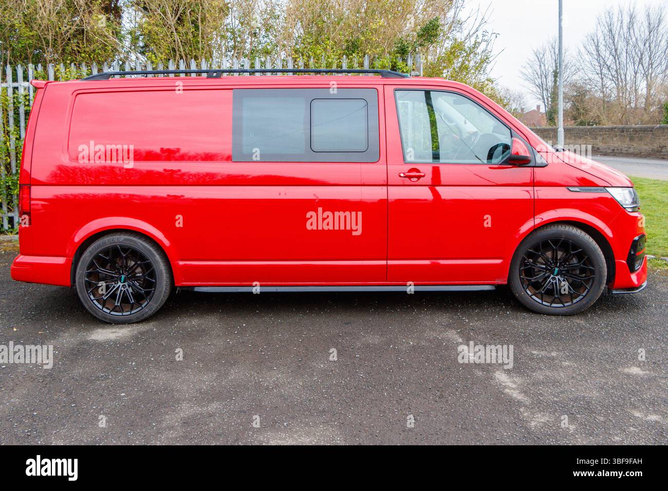 side view bright red LWB Volkswagen VW Transporter T6 T6.1 camper van ...