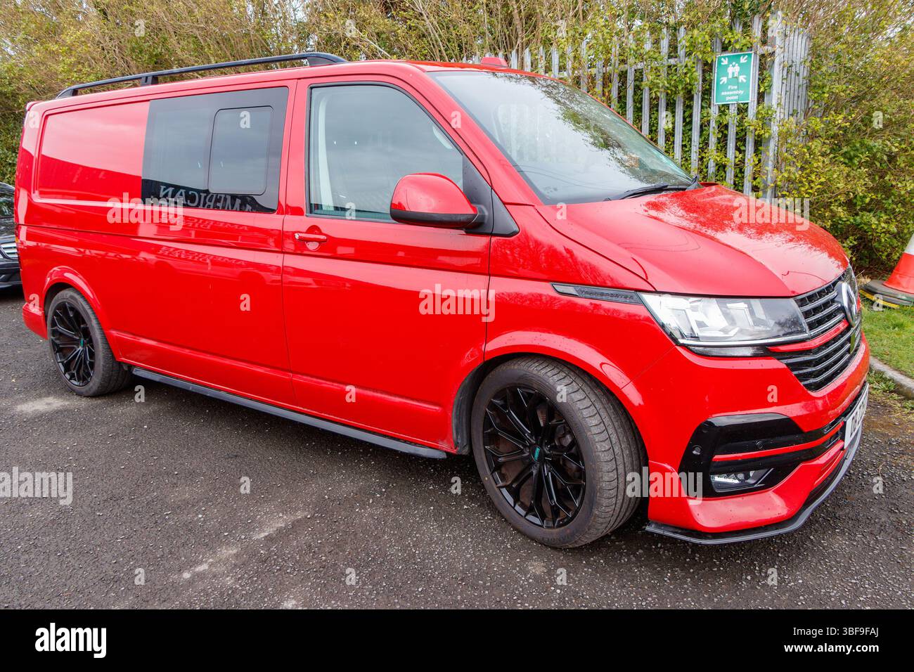 side view bright red LWB Volkswagen VW Transporter T6 T6.1 camper van ...