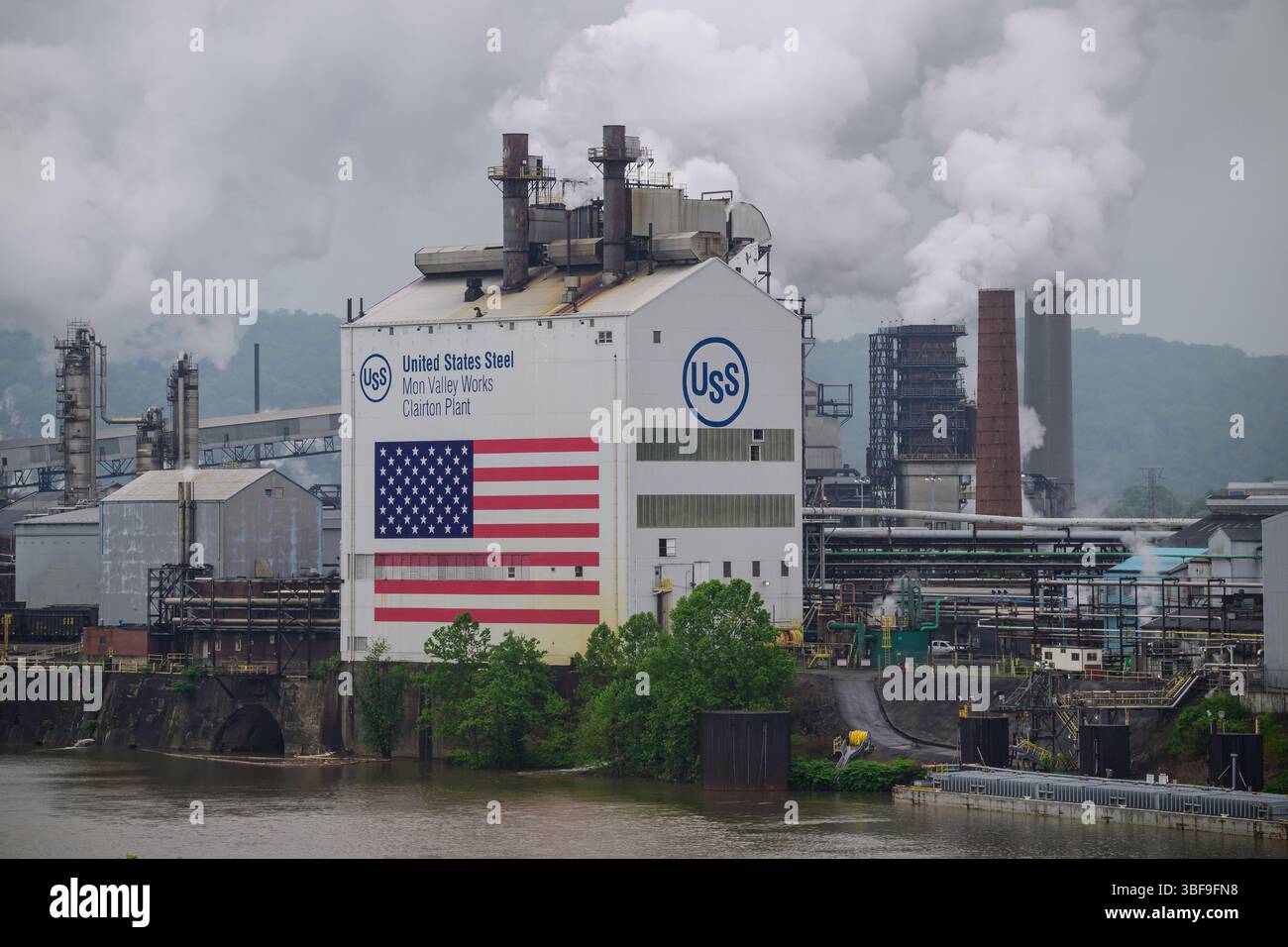 Steam emerging from a coke battery during quenching at U. S. Steel’s ...