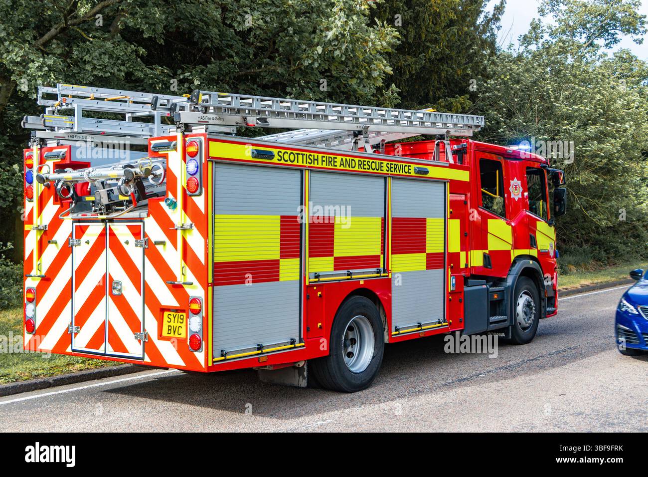 A Scottish Fire and Rescue Service fire engine on a shout on a tree ...