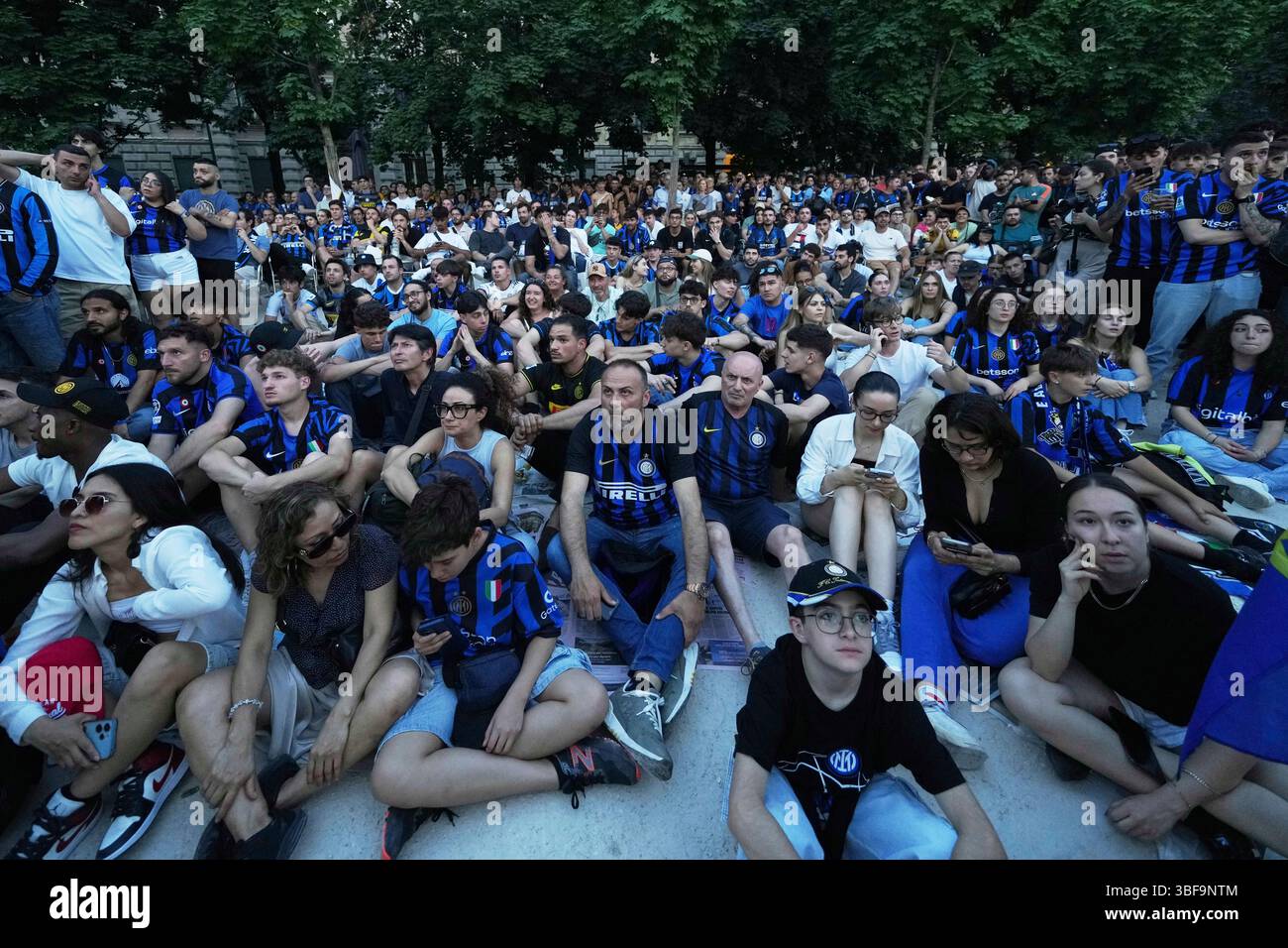 Inter Milan fans watch on a screen the Champions League final soccer ...