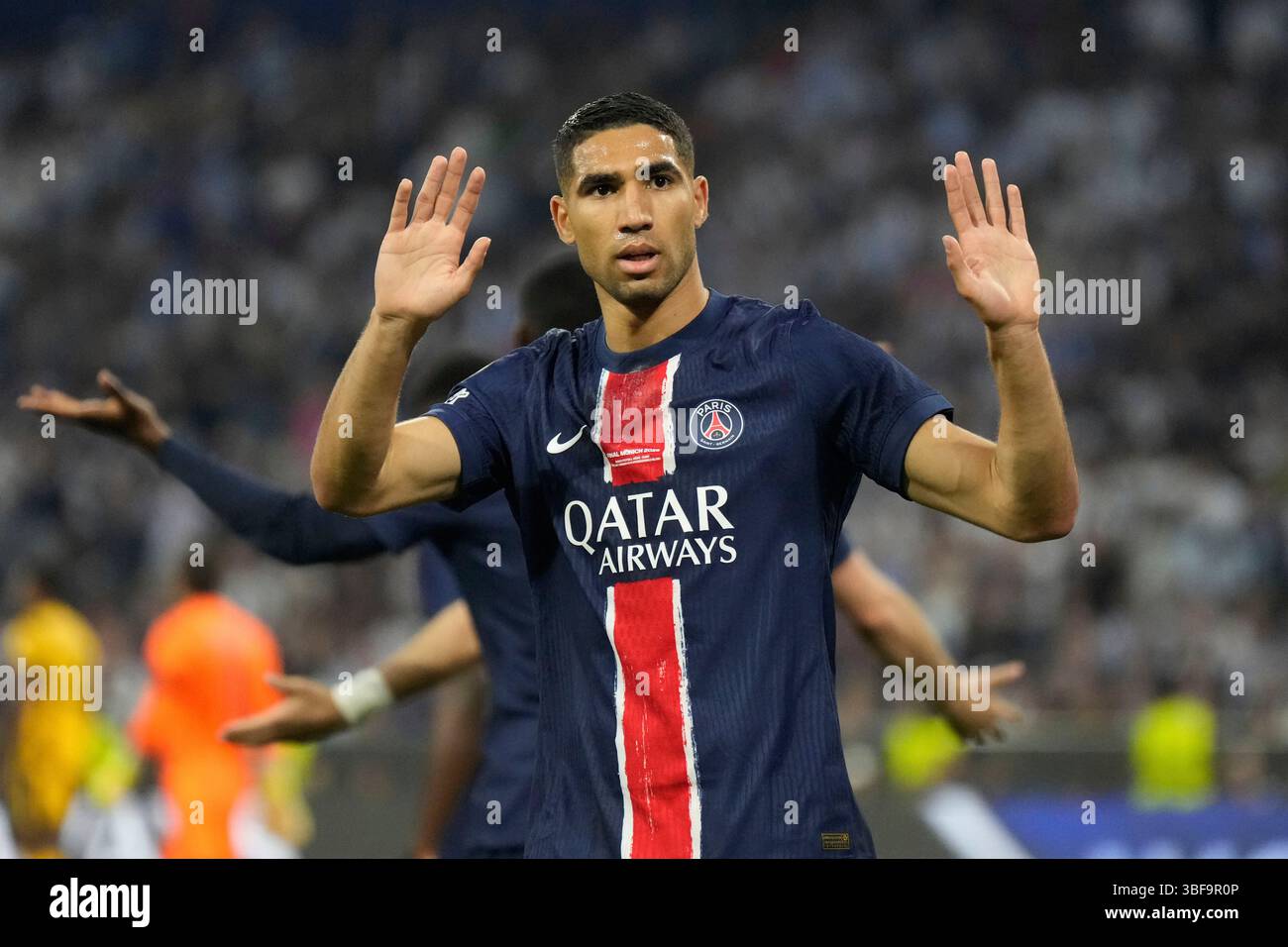 PSG's Achraf Hakimi celebrates after scoring his side's first goal ...