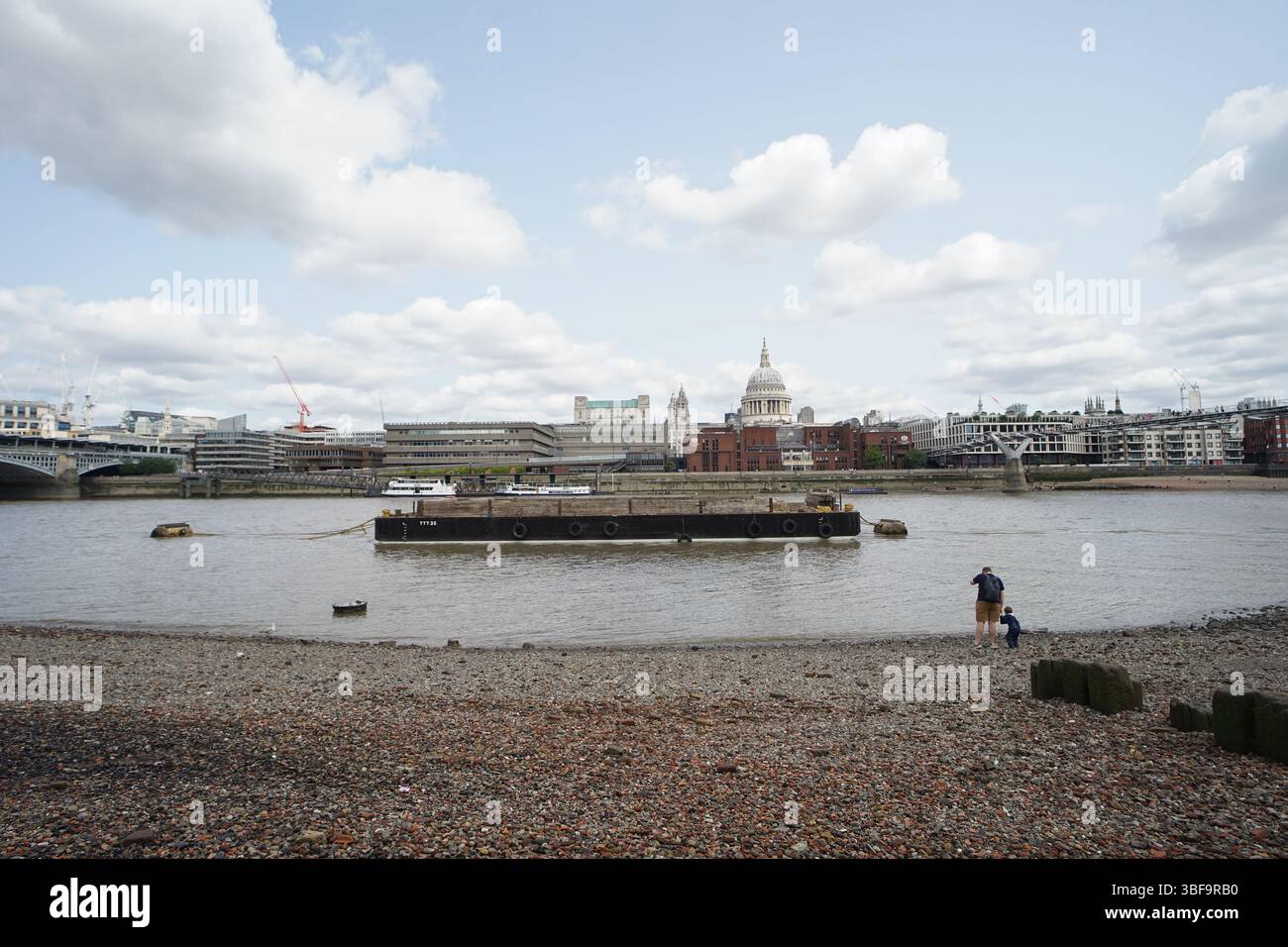 LONDON, ENGLAND, 31 May 2025: River Thames at the London's Riverside ...