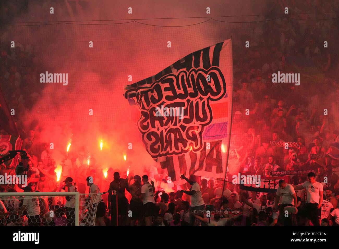PSG fans celebrate after Desire Doue scored his side's second goal ...