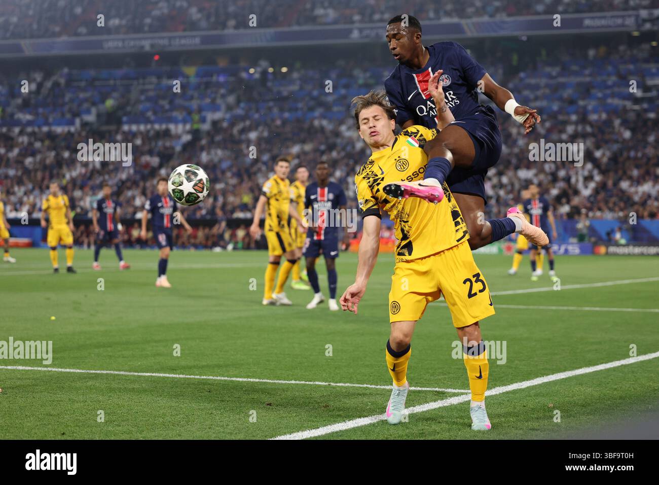 PSG's Willian Pacho kicks the ball by Inter Milan's Nicolo Barella ...