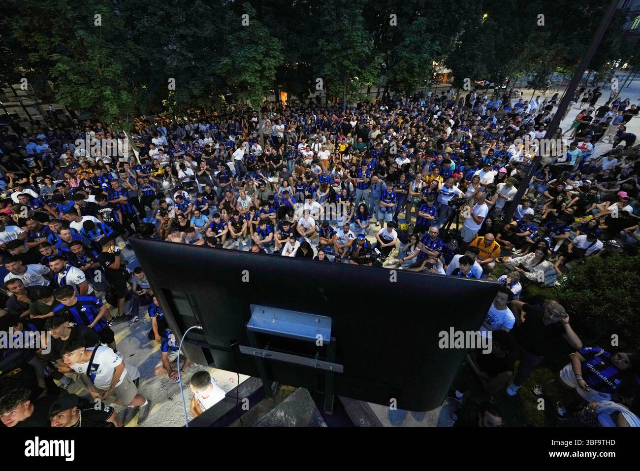 Inter Milan fans watch on a screen the Champions League final soccer ...
