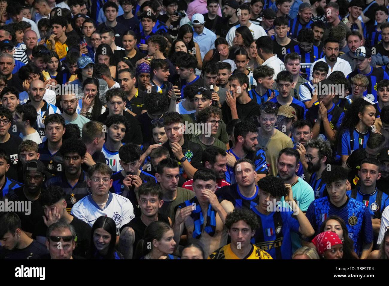 Inter Milan fans watch on a screen the Champions League final soccer ...