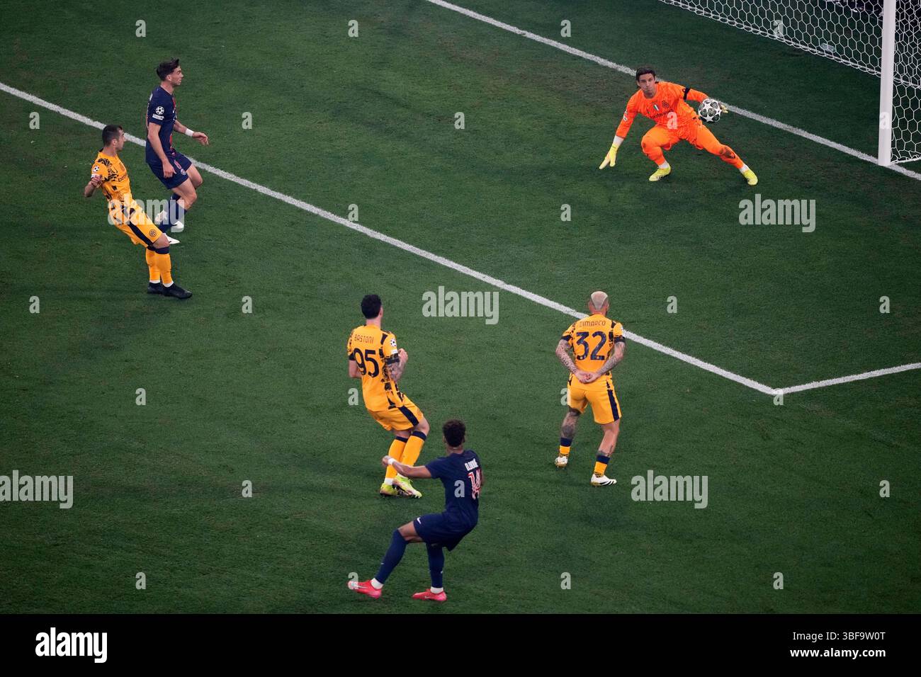 PSG's Desire Doue (14) scores his side's 2nd goal against Inter Milan ...
