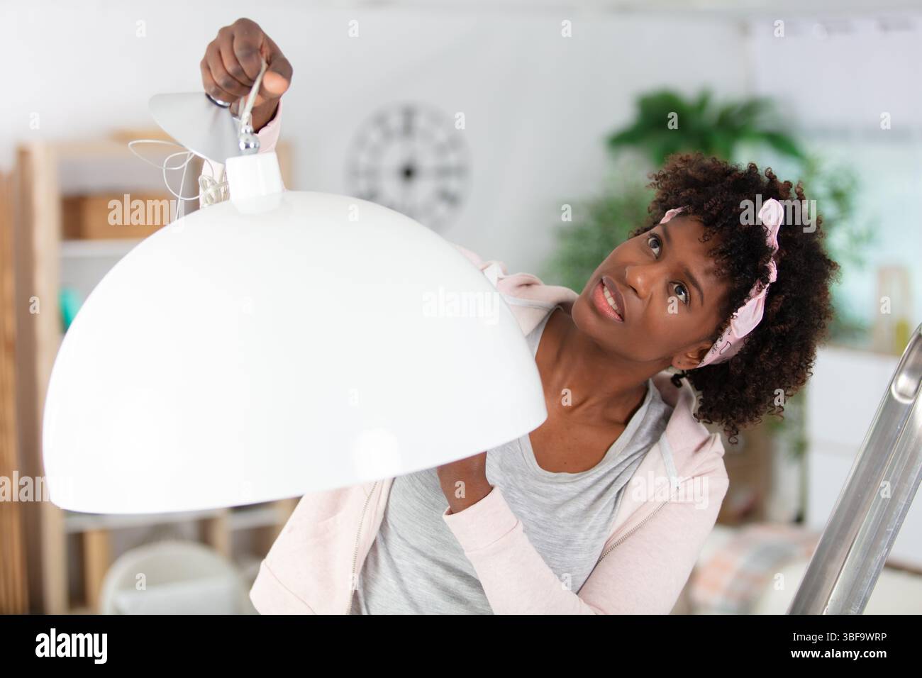 Mature woman lamp shade hi-res stock photography and images - Alamy