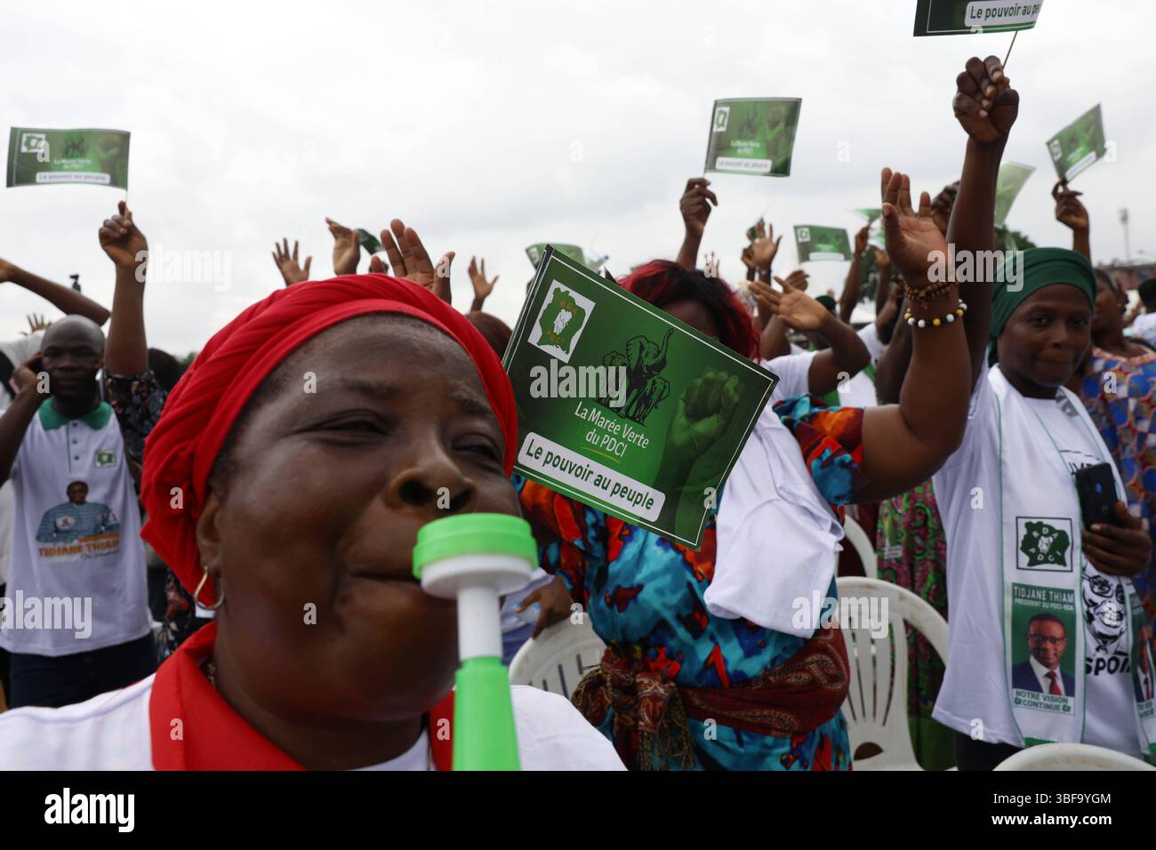 Opposition coalition rally in Abidjan, Ivory Coast Supporters react at ...