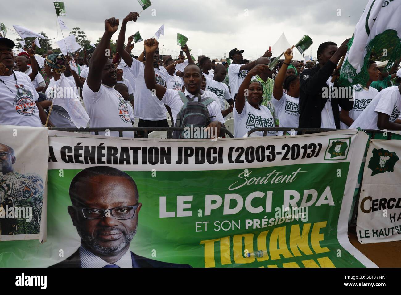 Opposition coalition rally in Abidjan, Ivory Coast Supporters react at ...