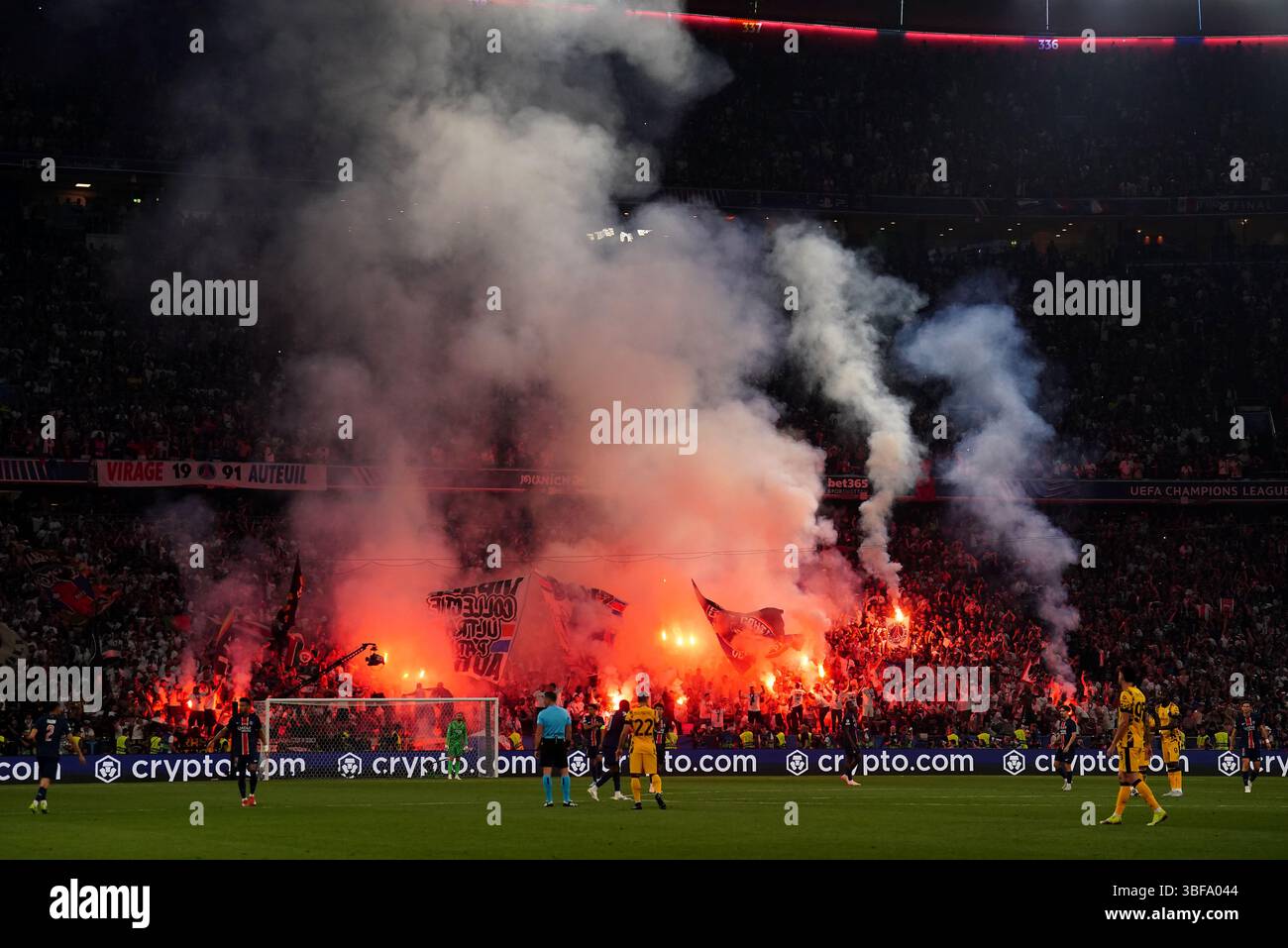 Paris Saint Germain fans set off flares in the stands during the UEFA ...
