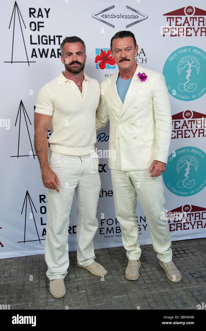 Actor Luke Evans and his boyfriend, Fran Tomás, pose during the ...