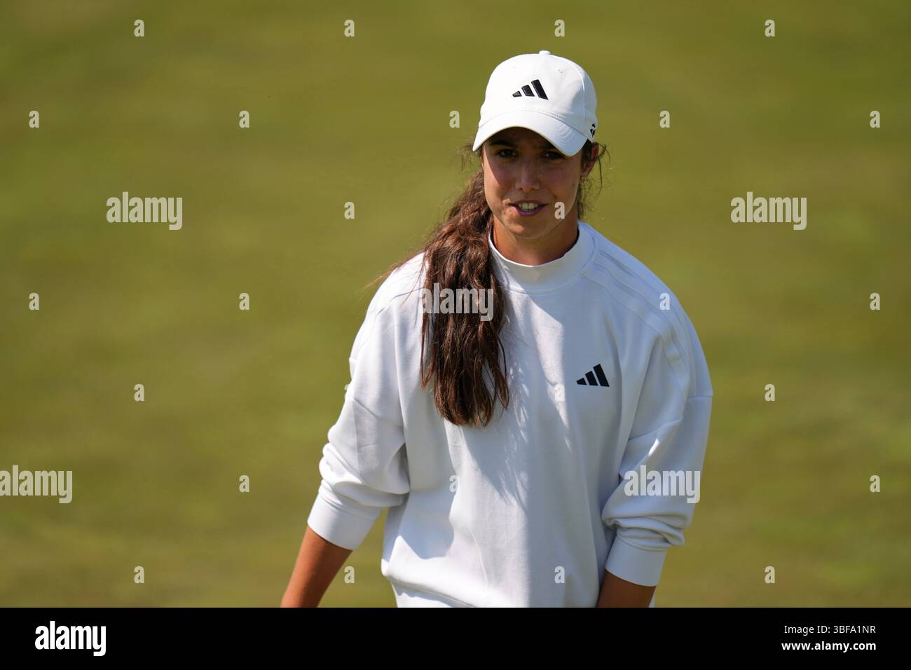 Julia Lopez Ramirez, of Spain, looks over a putt on the 15th hole ...
