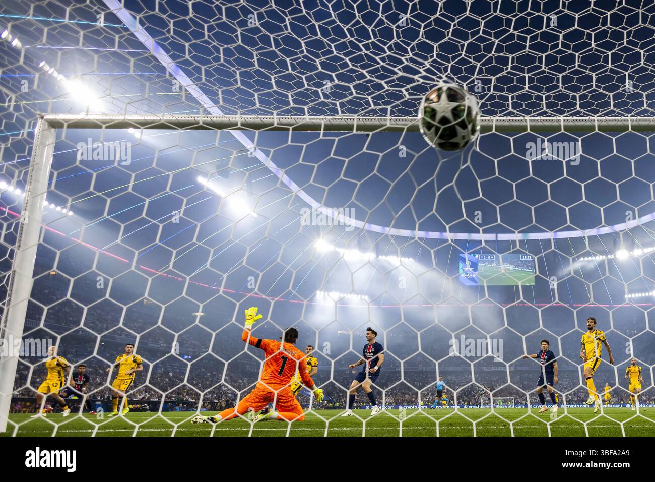 PSG's Desire Doue, second left, scores his side's second goal during ...