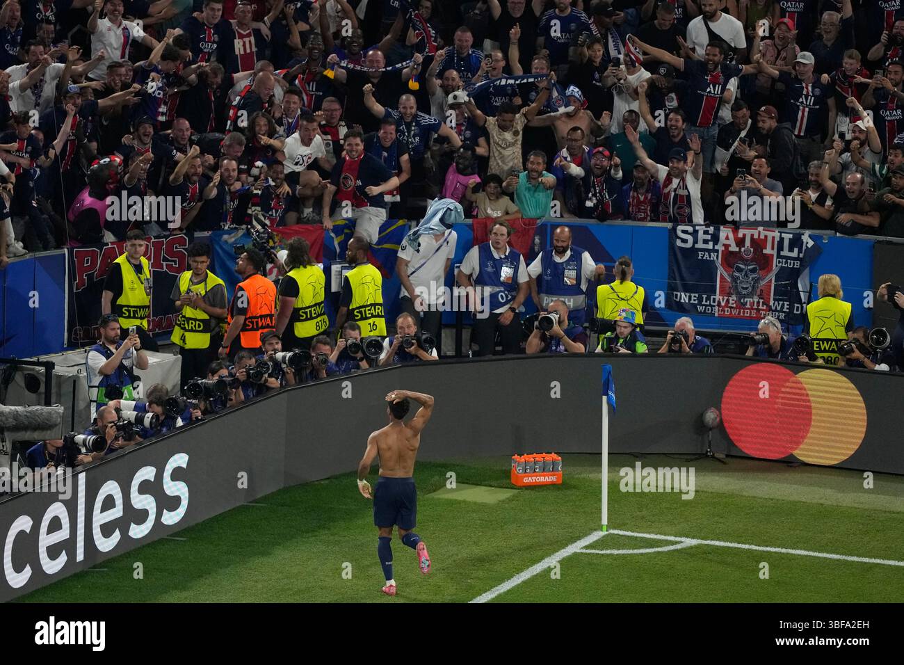 PSG's Desire Doue celebrates after scoring his side's third goal ...