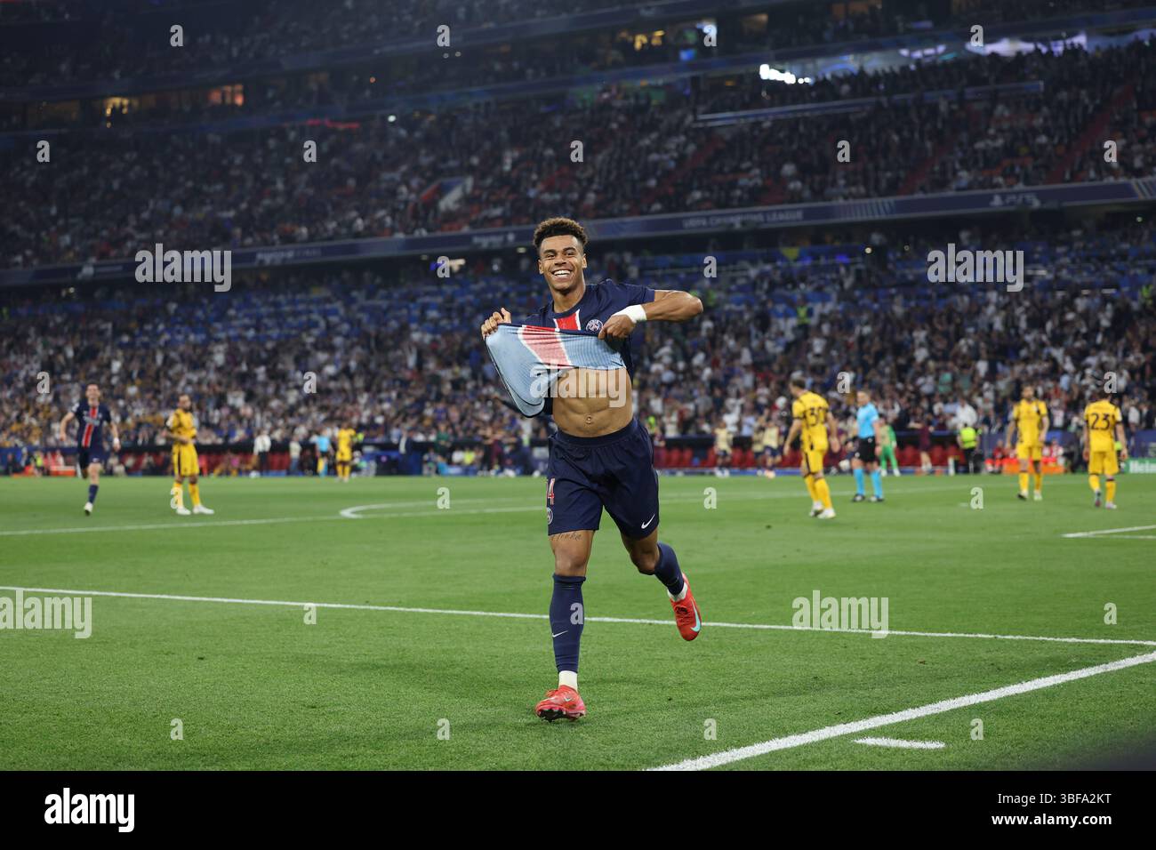 PSG's Desire Doue celebrates after he scored thrid goal during the ...